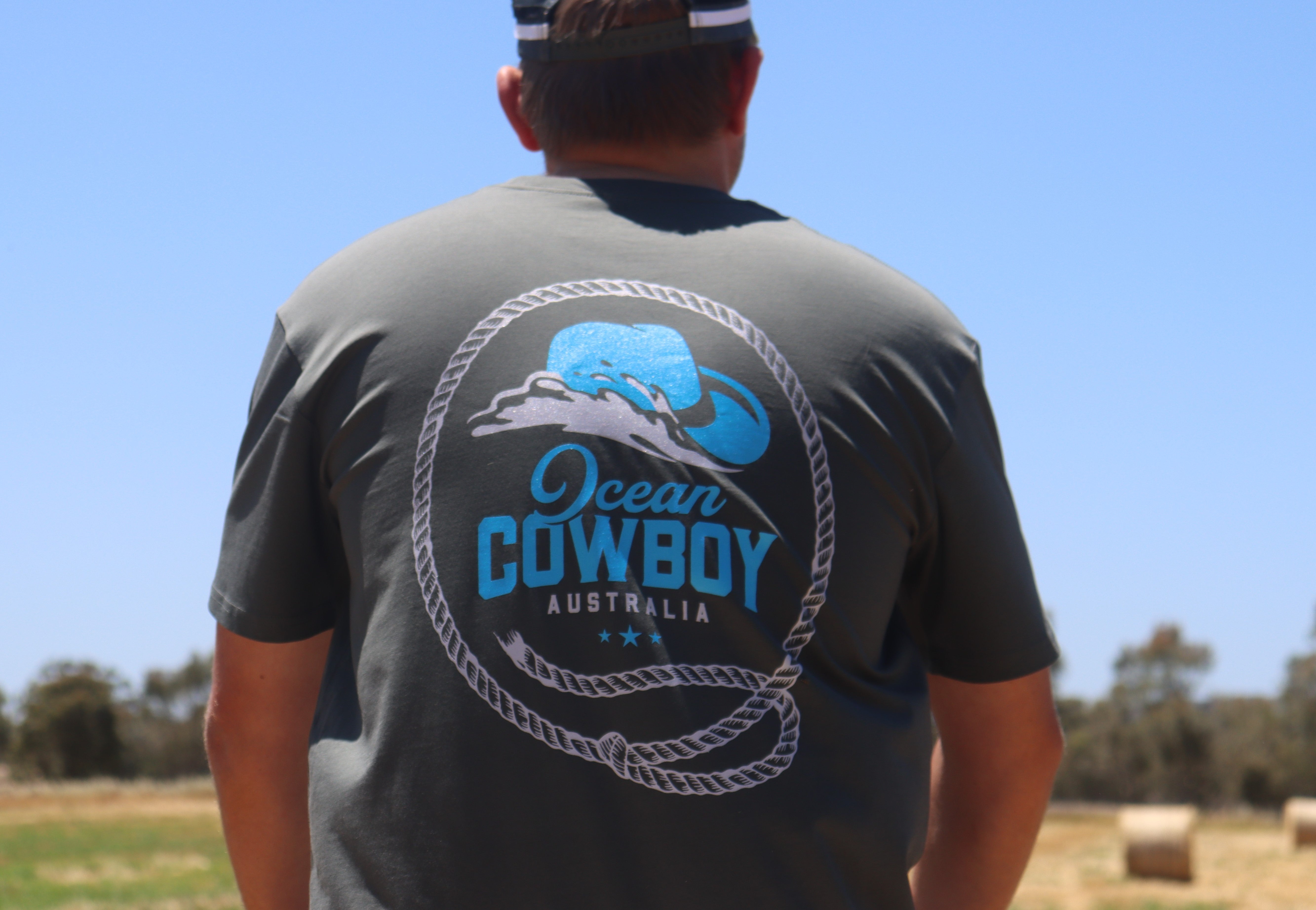 Ocean Cowboy Charcoal Tee - Blue Logo – Ocean Cowboy Australia