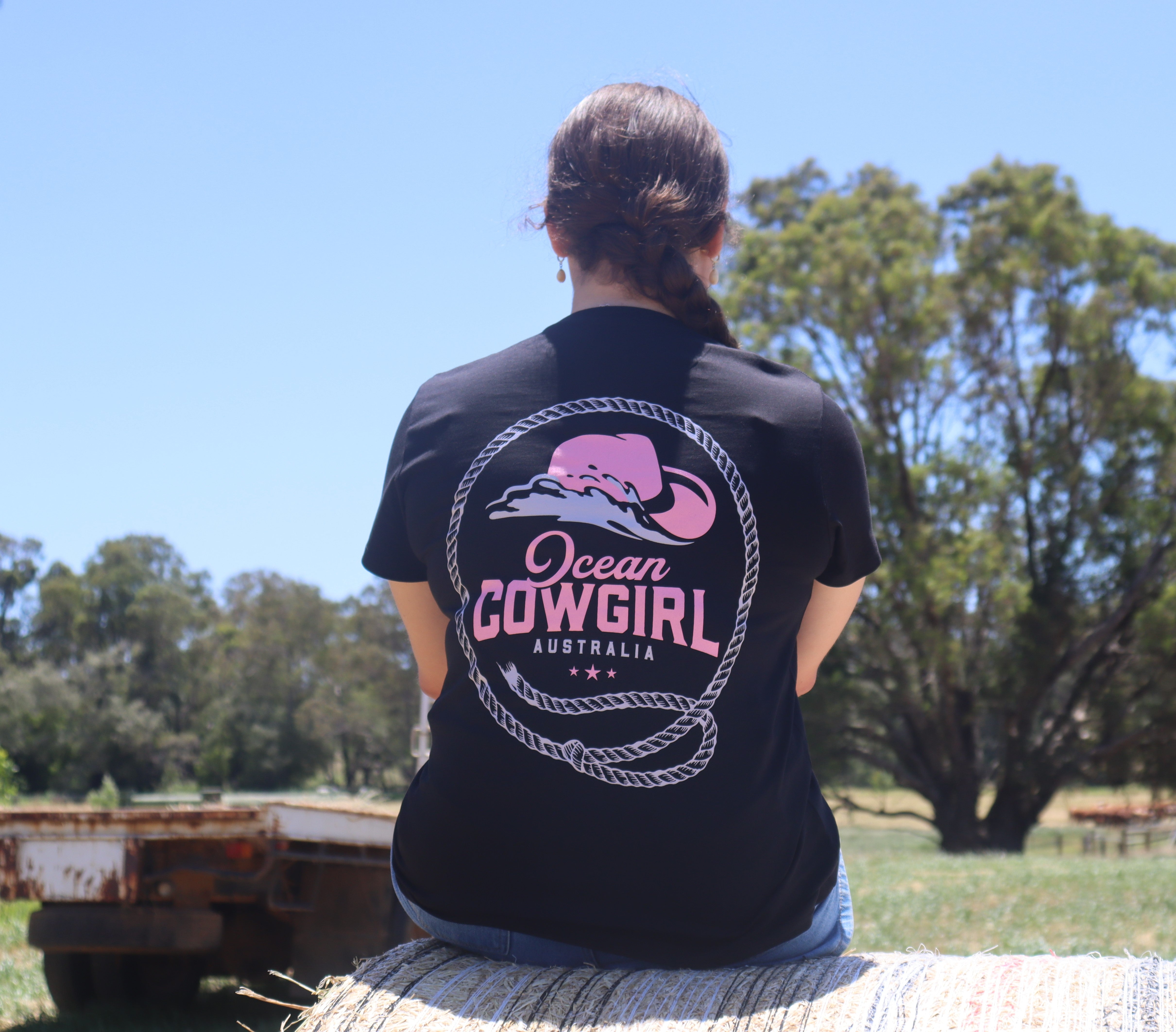 Ocean Cowgirl Black Tee - Pink Logo – Ocean Cowboy Australia